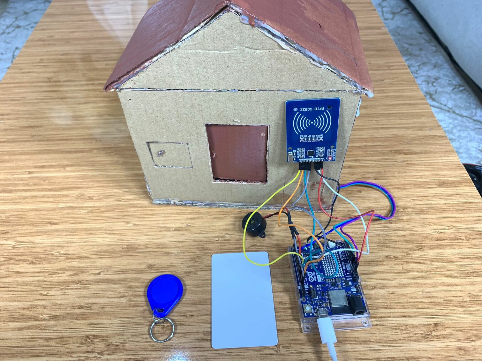 Build a Smart Cardboard House with Arduino Uno R4 and RFID - Upload ...